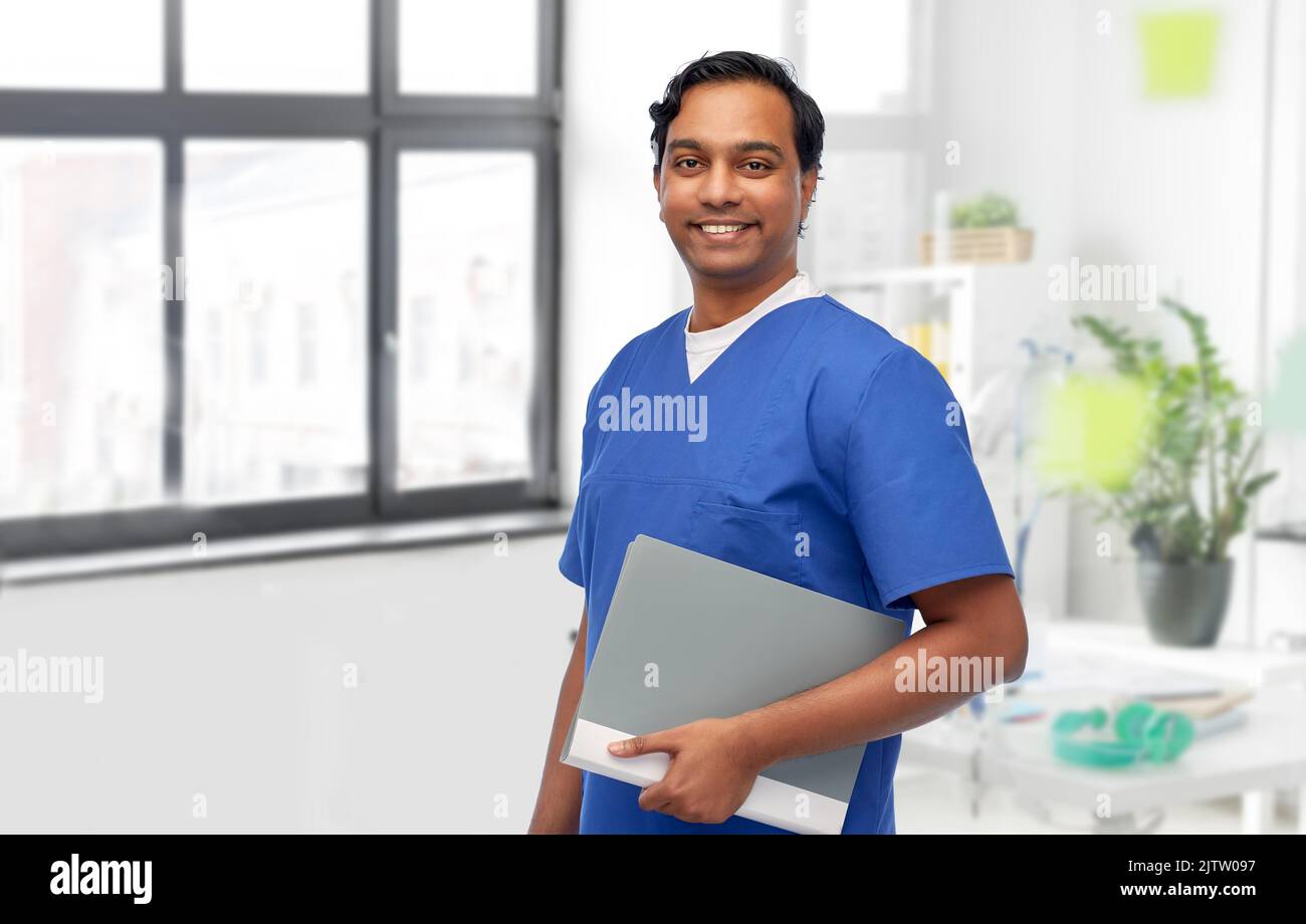 Indian male doctor papers hi-res stock photography and images - Alamy