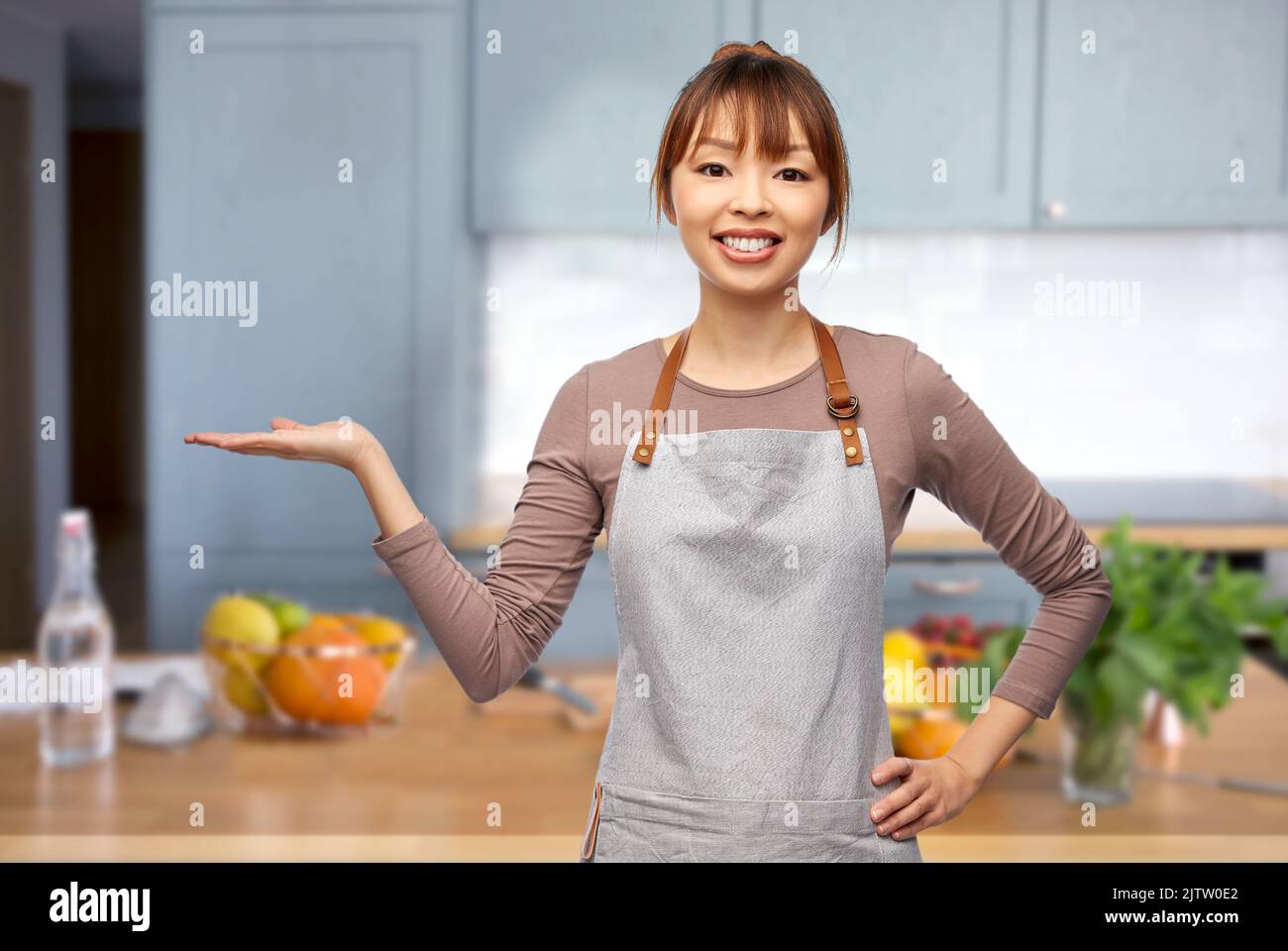 Happy chef showing something hi-res stock photography and images - Alamy