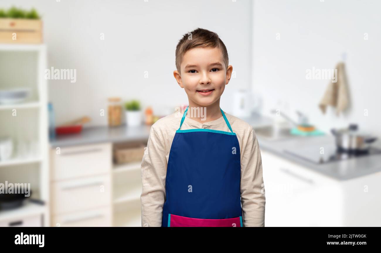 Teen boy cooking in the kitchen hi-res stock photography and images - Alamy