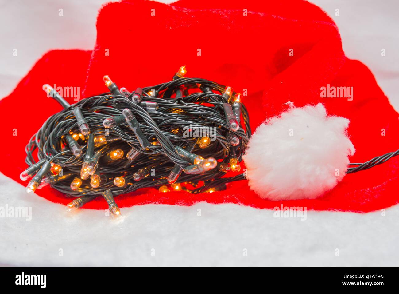 Christmas decorative lights with a red hat on a white background in Rio ...