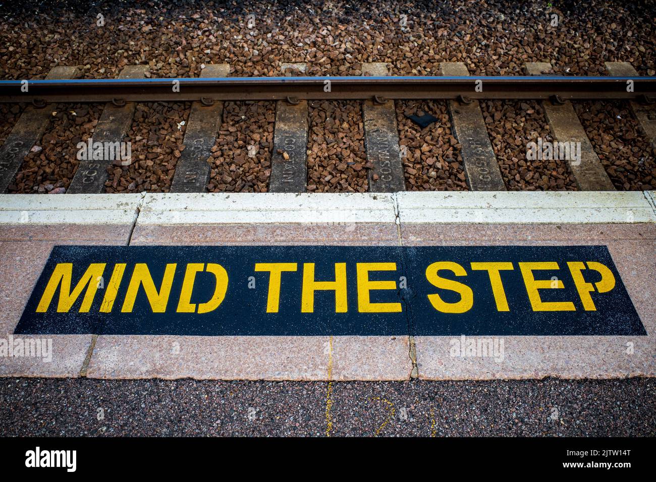 Mind The Step Sign on a British Railway Station Platform. Railway ...