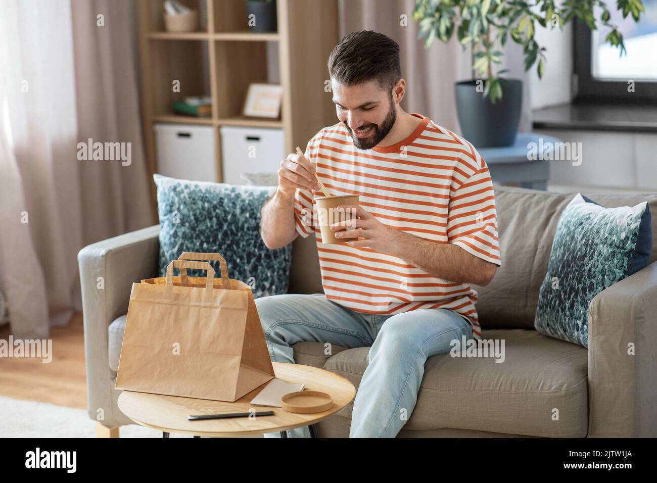 Asian man eating sofa hi-res stock photography and images - Alamy