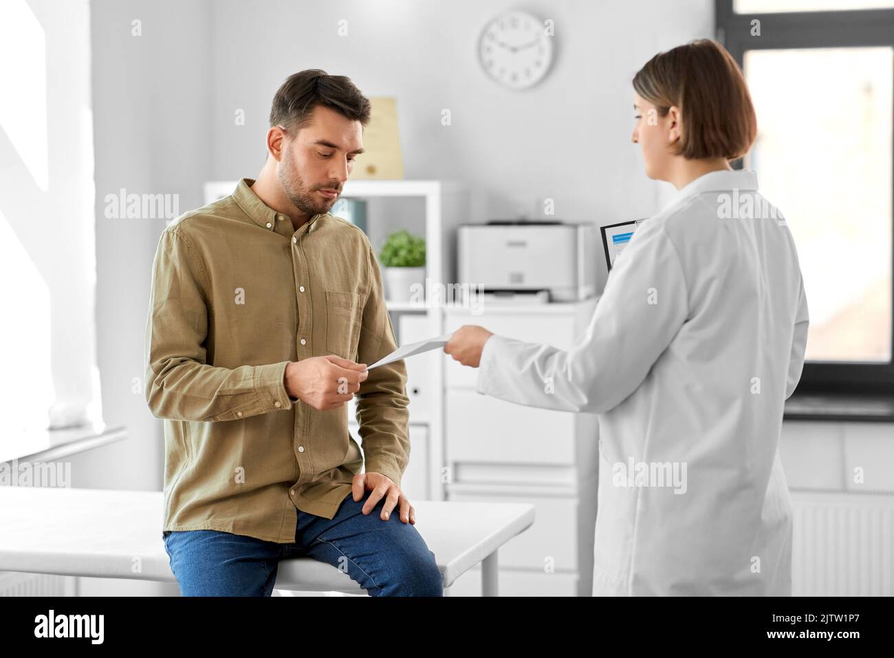 Giving diagnosis hi-res stock photography and images - Alamy