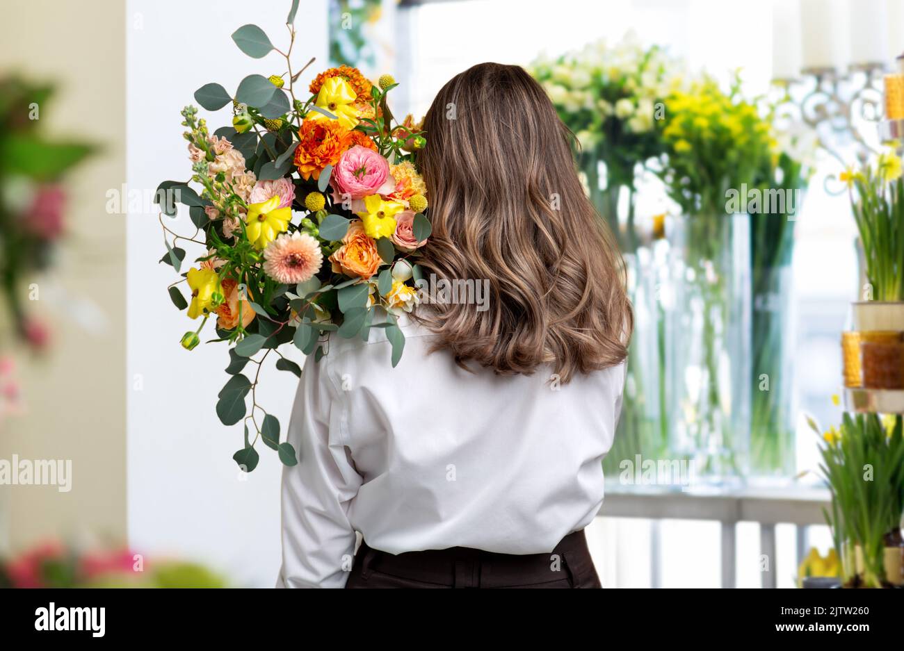 Back view young woman gardener hi-res stock photography and images - Alamy