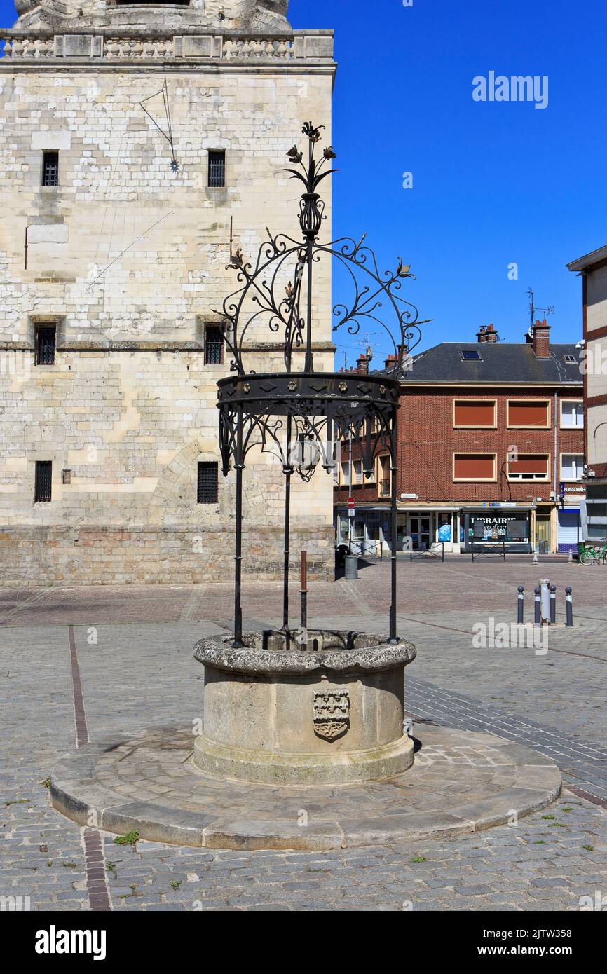 Medieval well in front of the15th century belfry (a UNESCO World ...
