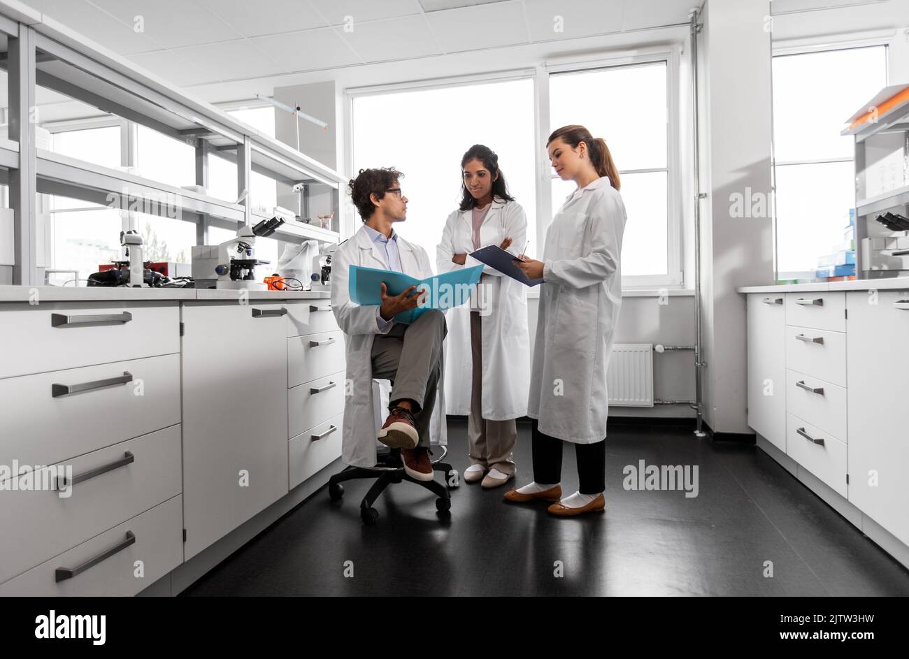 international group of scientists in laboratory Stock Photo - Alamy