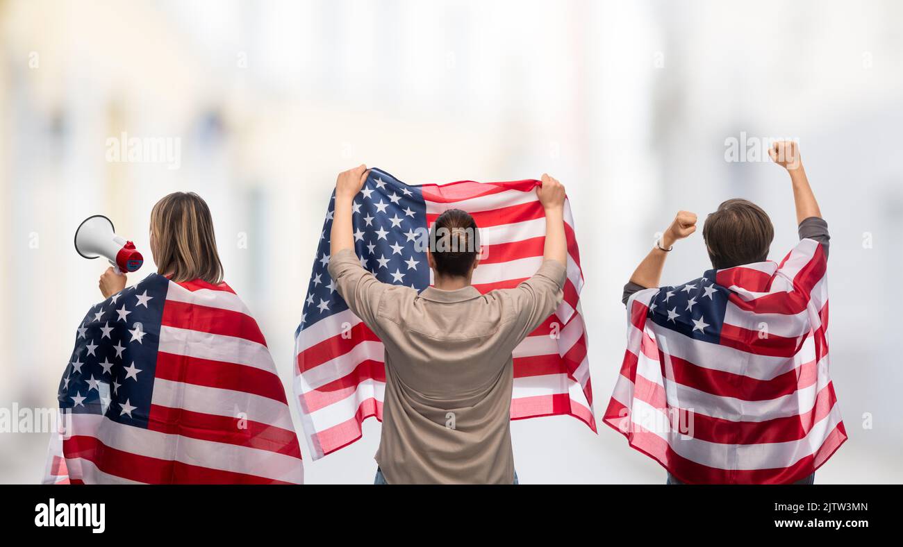 protesting people with flags of united states Stock Photo - Alamy