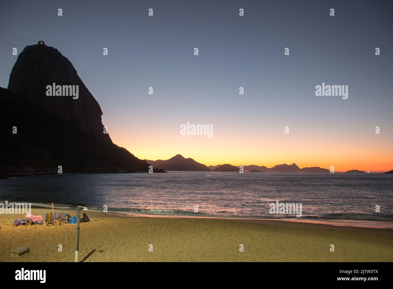 sunrise on the red beach of the Urca neighborhood in Rio de Janeiro ...