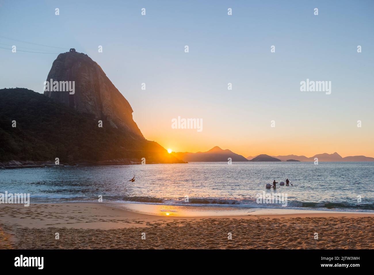 sunrise on the red beach of the Urca neighborhood in Rio de Janeiro ...