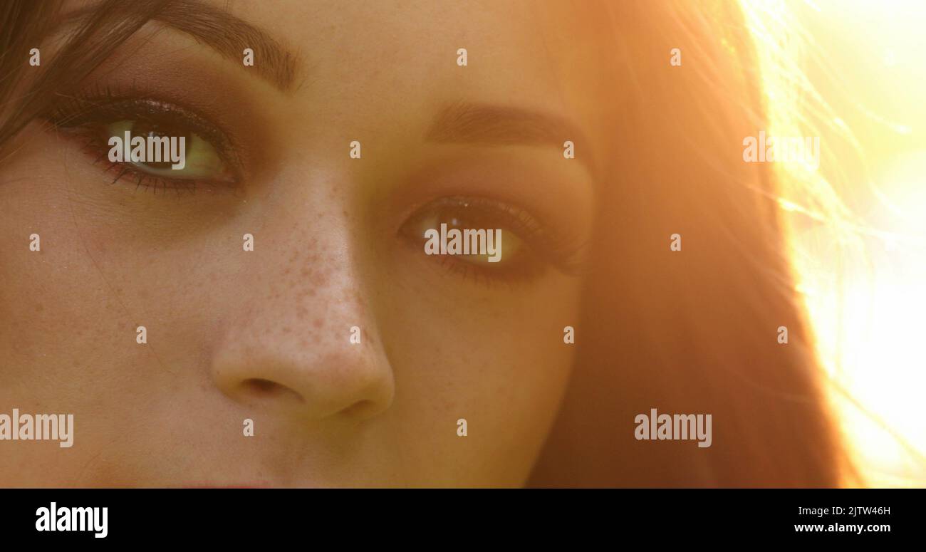 Pretty girl in her 20s looking to camera sensually. Dreamlike closeup ...