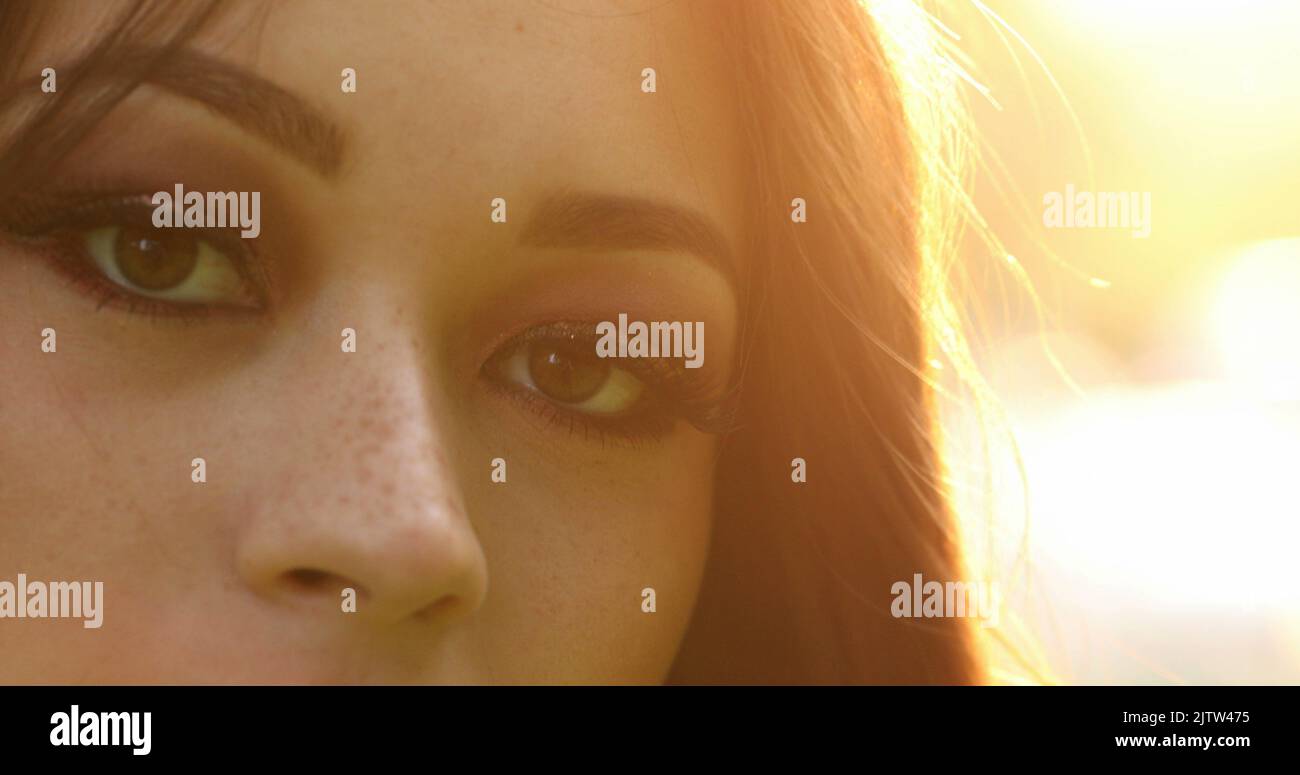 Pretty girl in her 20s looking to camera sensually. Dreamlike closeup ...