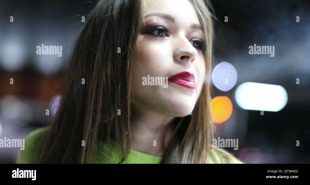 Pretty girl lighting a cigarette at night in nightlife Stock Photo - Alamy