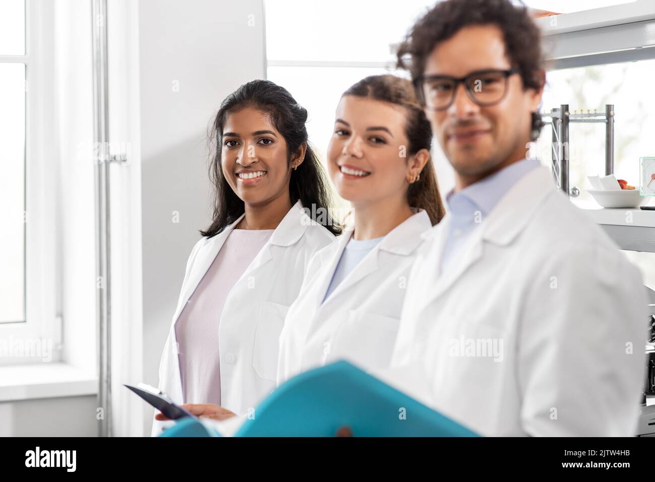 international group of scientists in laboratory Stock Photo - Alamy