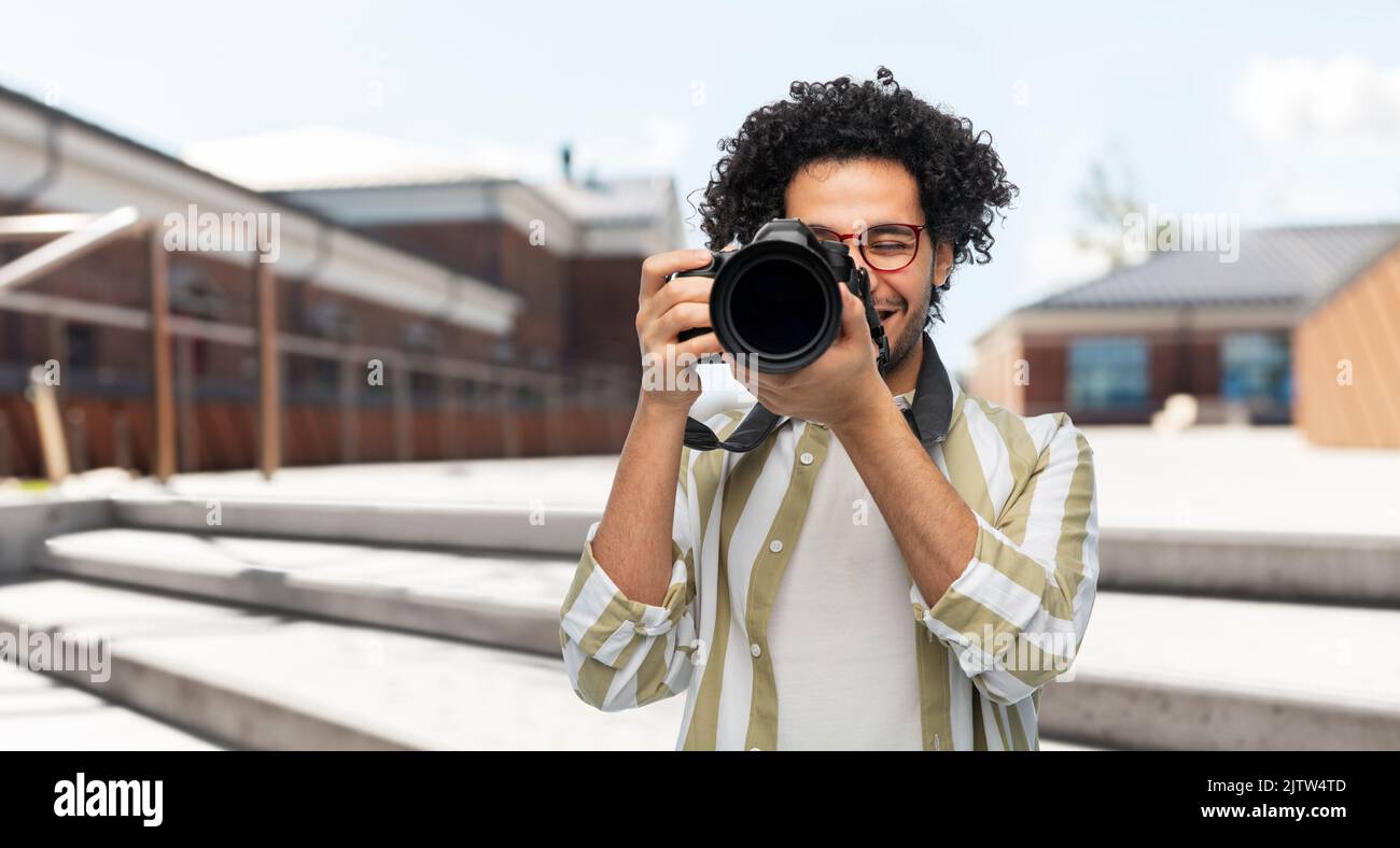Happy photographer smiling hi-res stock photography and images - Alamy