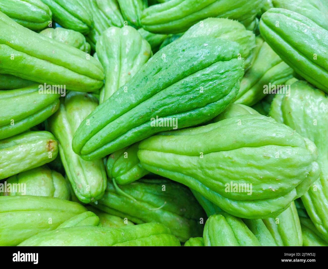 vegetable known as chayote, on a stall at an open market in Rio de ...