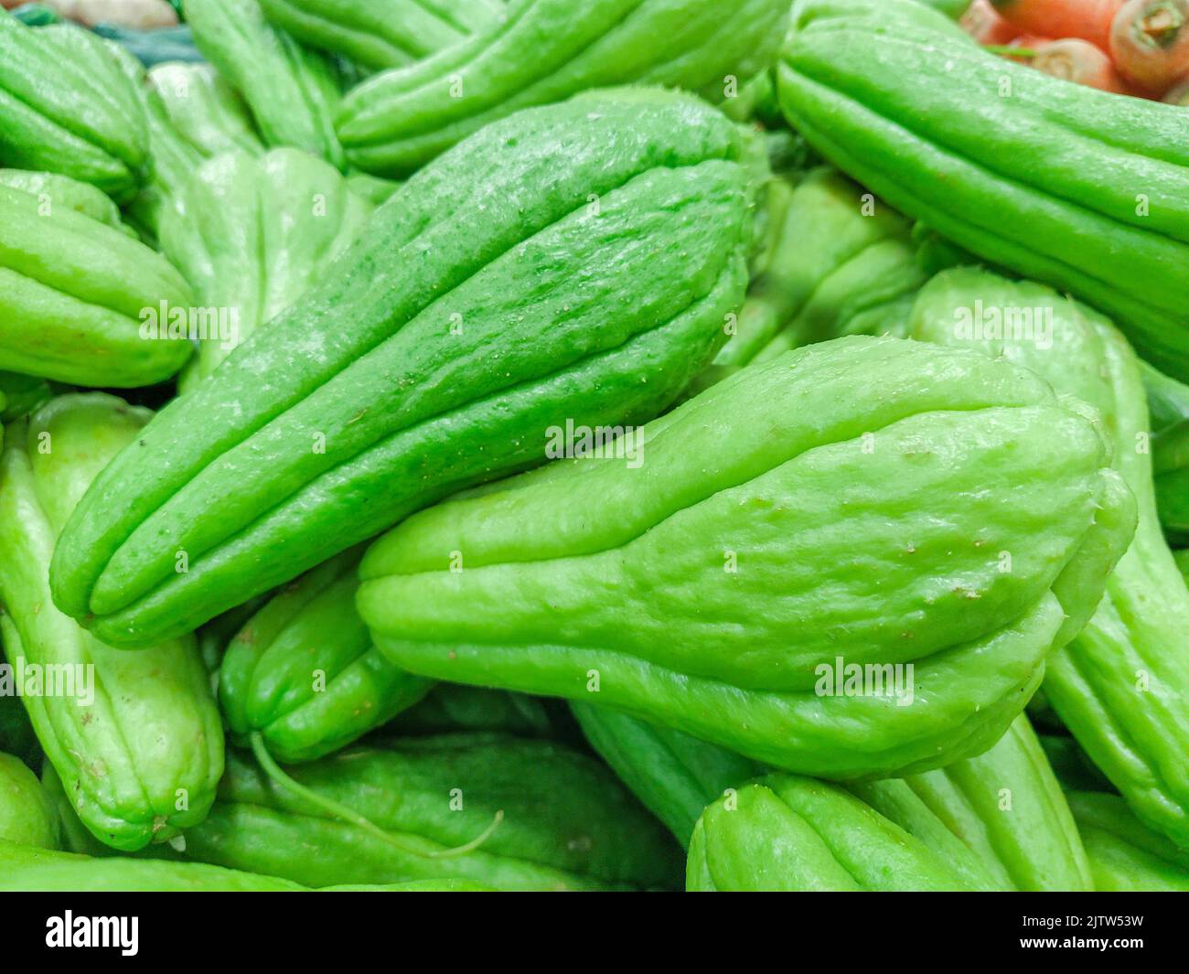 vegetable known as chayote, on a stall at an open market in Rio de ...
