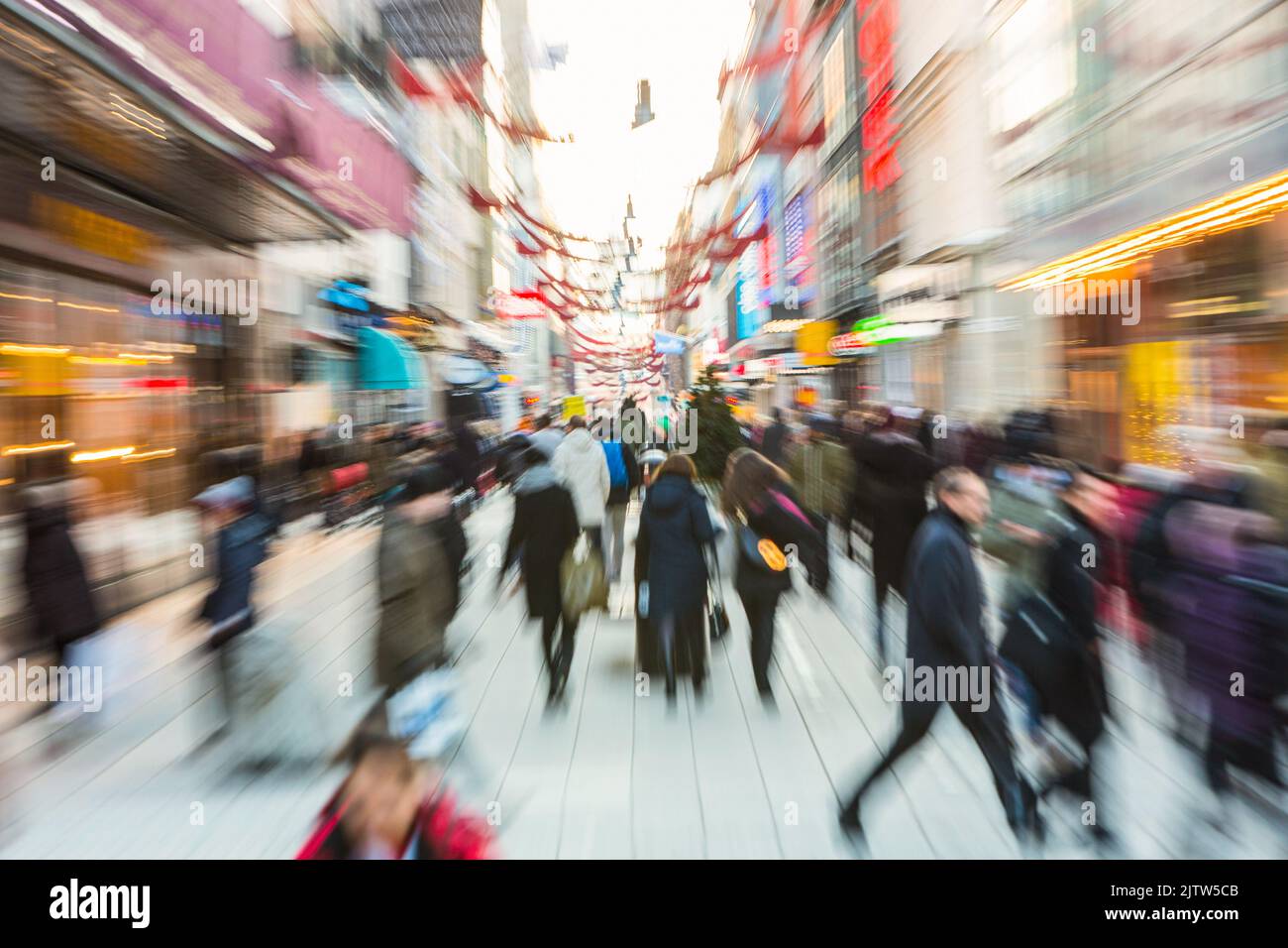 Busy shopping street in rush hour Stock Photo - Alamy