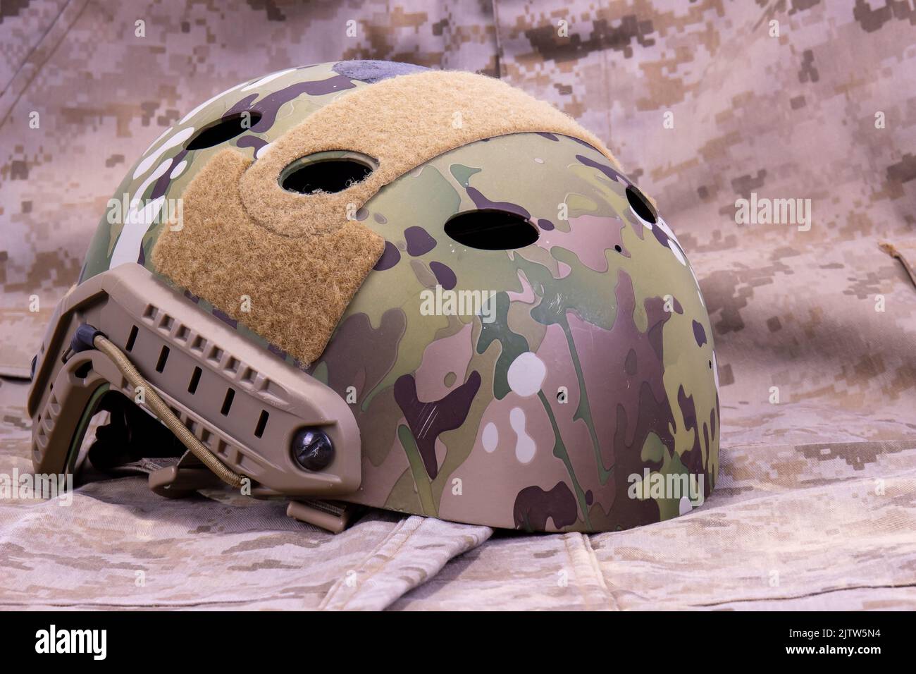 American Military Helmet On Desert Camouflage Uniform Stock Photo - Alamy