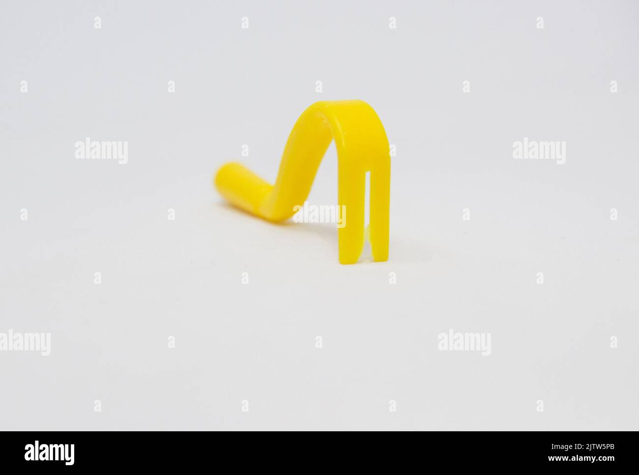 object known as a tick remover, used to remove ticks from people's ...