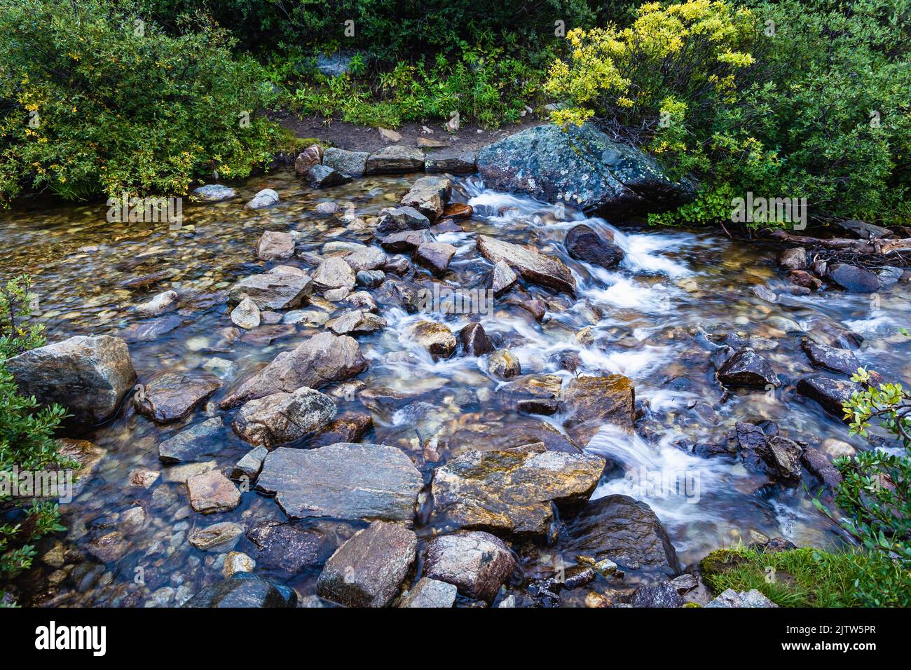 Stream running through a mountain valley close up. Image taken on the ...