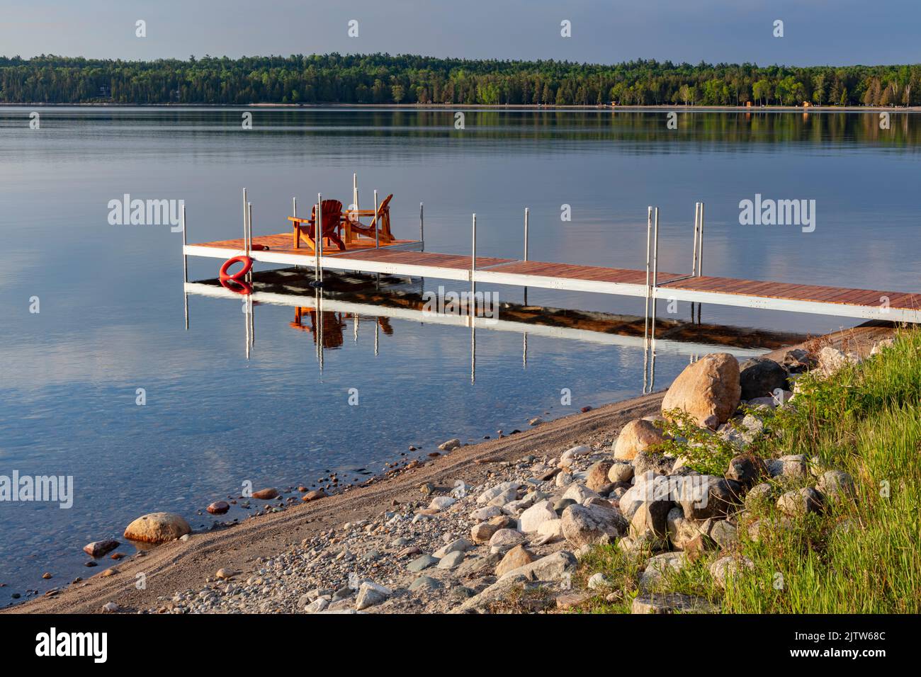 Water, woods, rocks, and chairs on a dock: these comprise an Iconic ...