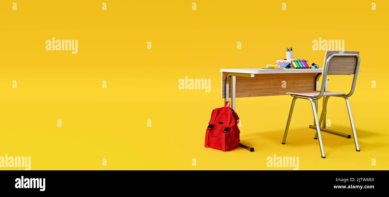 Modern school desk with school accessories and red backpack on honey ...