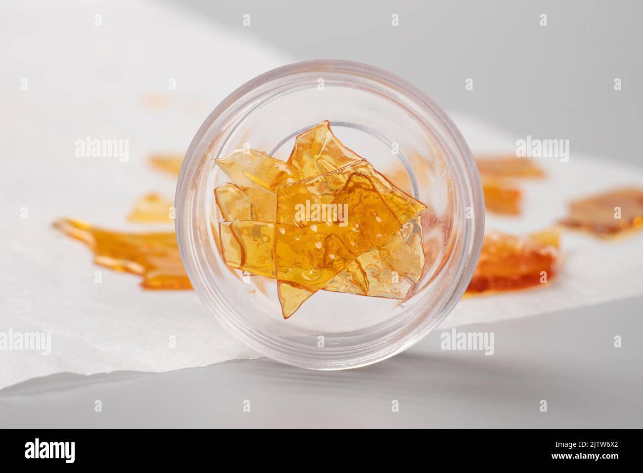 box with golden cannabis wax pieces, shatter resin Stock Photo - Alamy