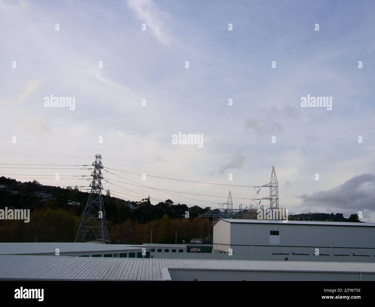 Storage Units And Power Pylons Stock Photo - Alamy