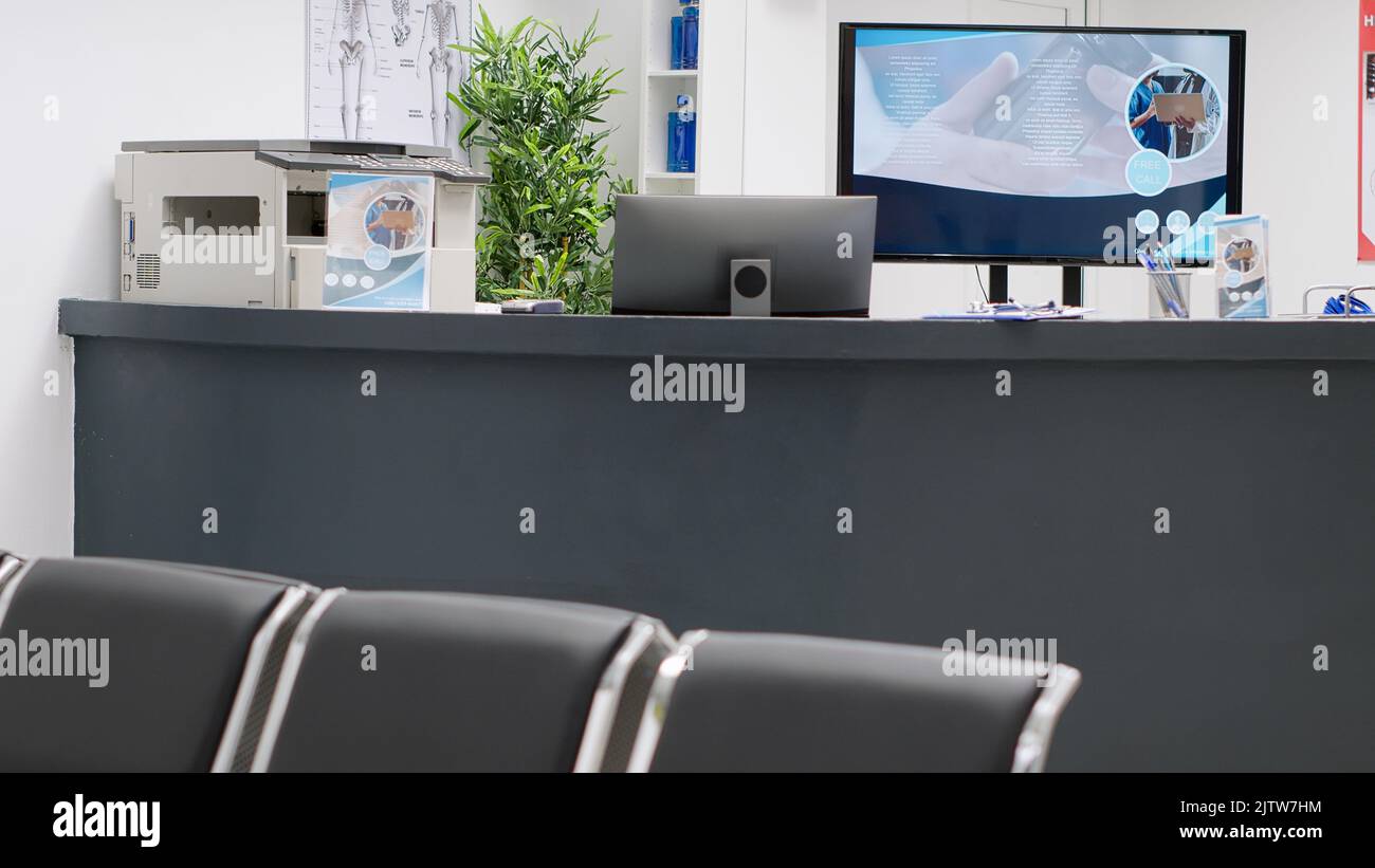 Empty hospital reception counter and waiting area lobby at healthcare ...