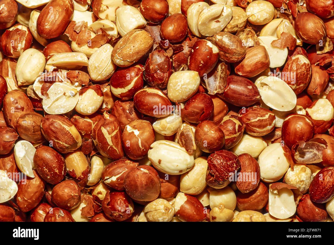 Peeled peanuts for background. Roasted peanut beans with skin Stock ...