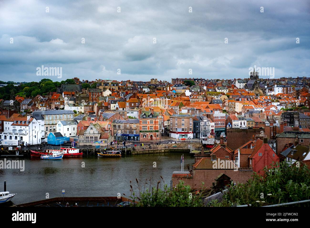 A view over Whitby harbour looking at the west side Stock Photo - Alamy
