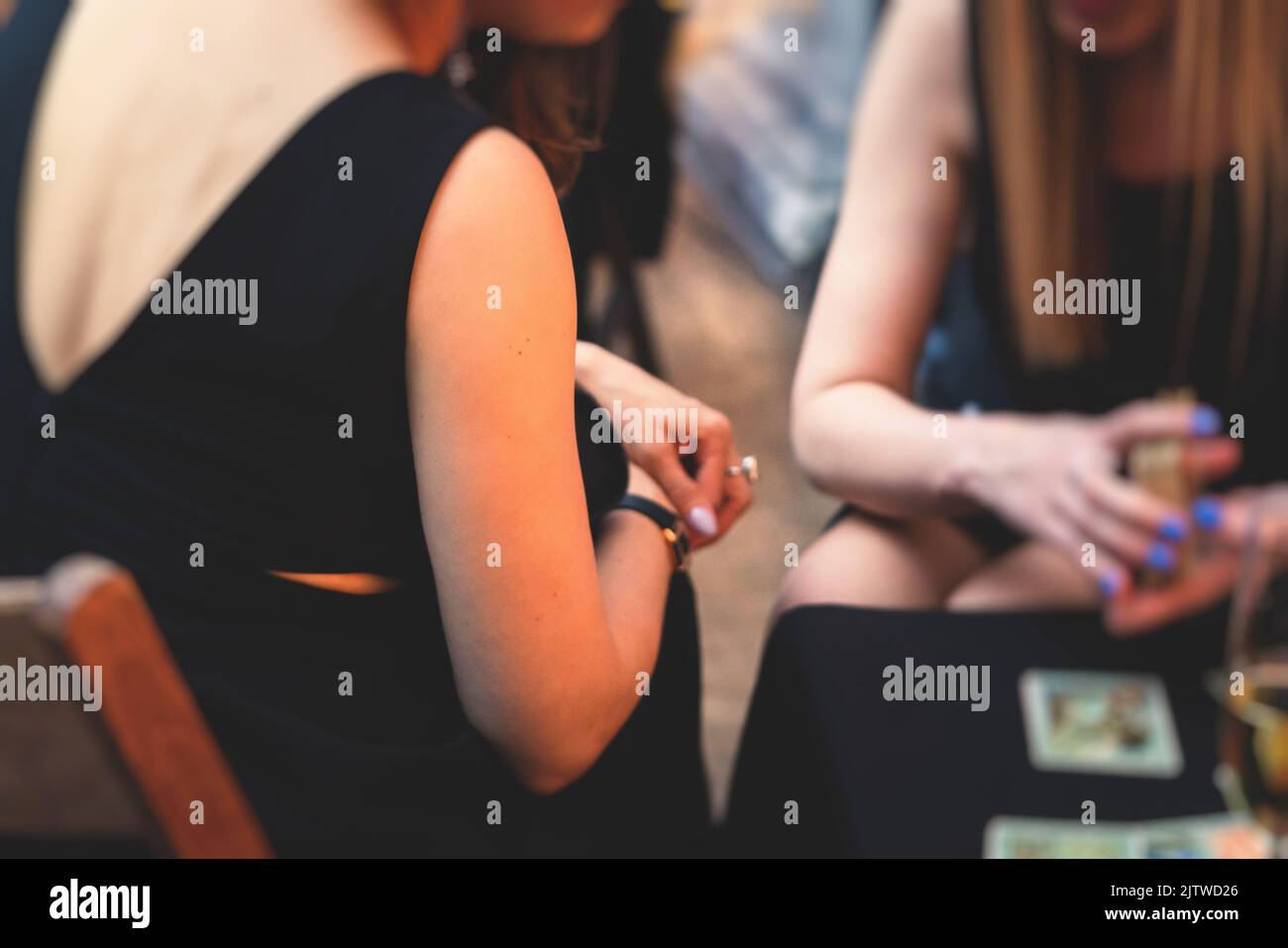 Process of tarot card reading and future fate prediction, fortune teller medium with the deck of ...