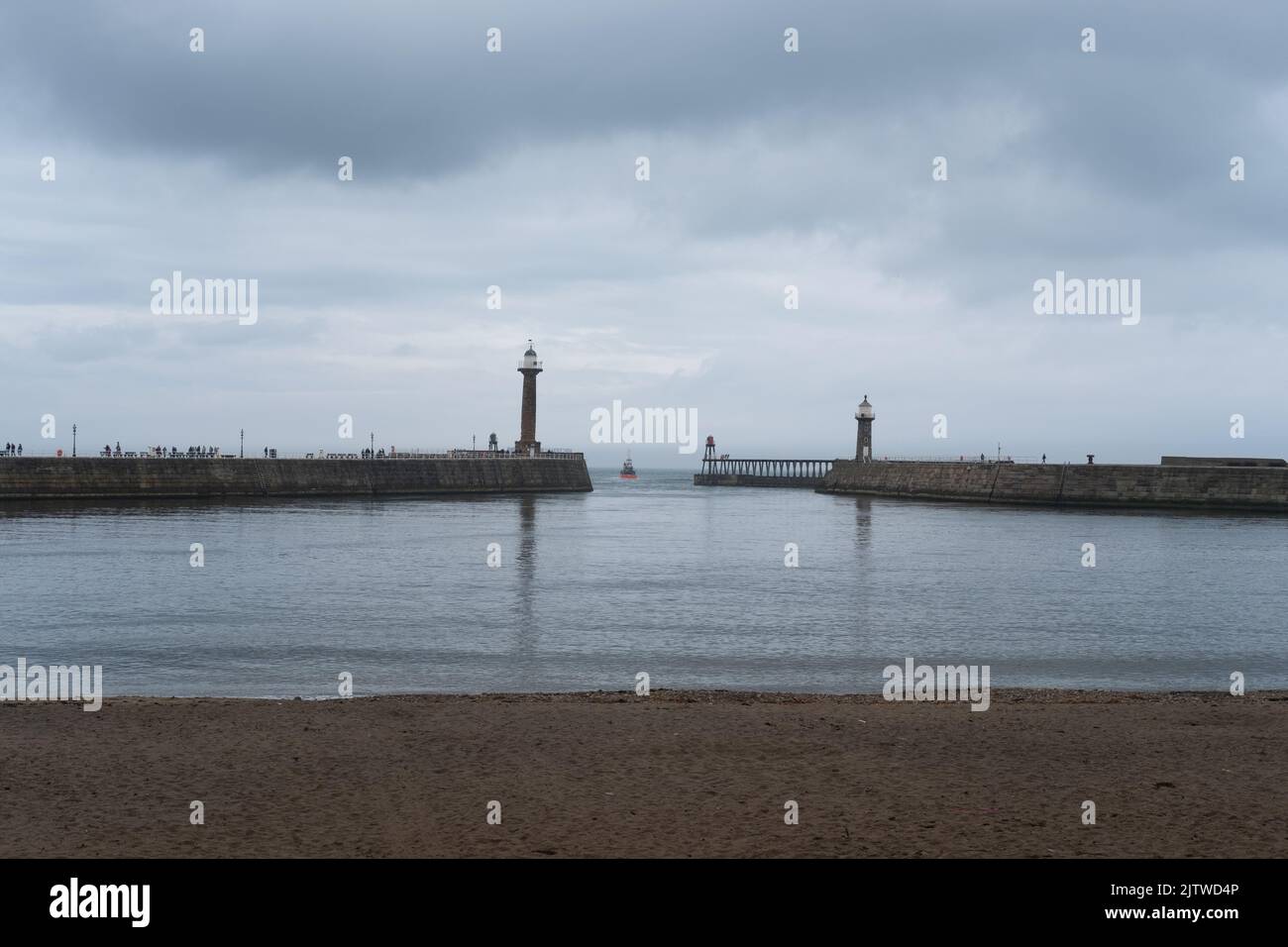 A view of Whitby Lighthouses and Piers Stock Photo - Alamy