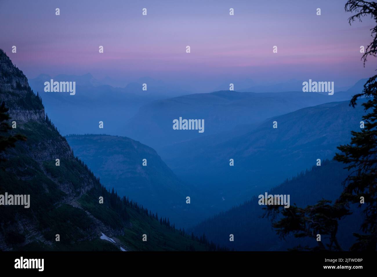 Layers of Mountains Fade Into The Forest Fire Smoke Of Glacier National ...
