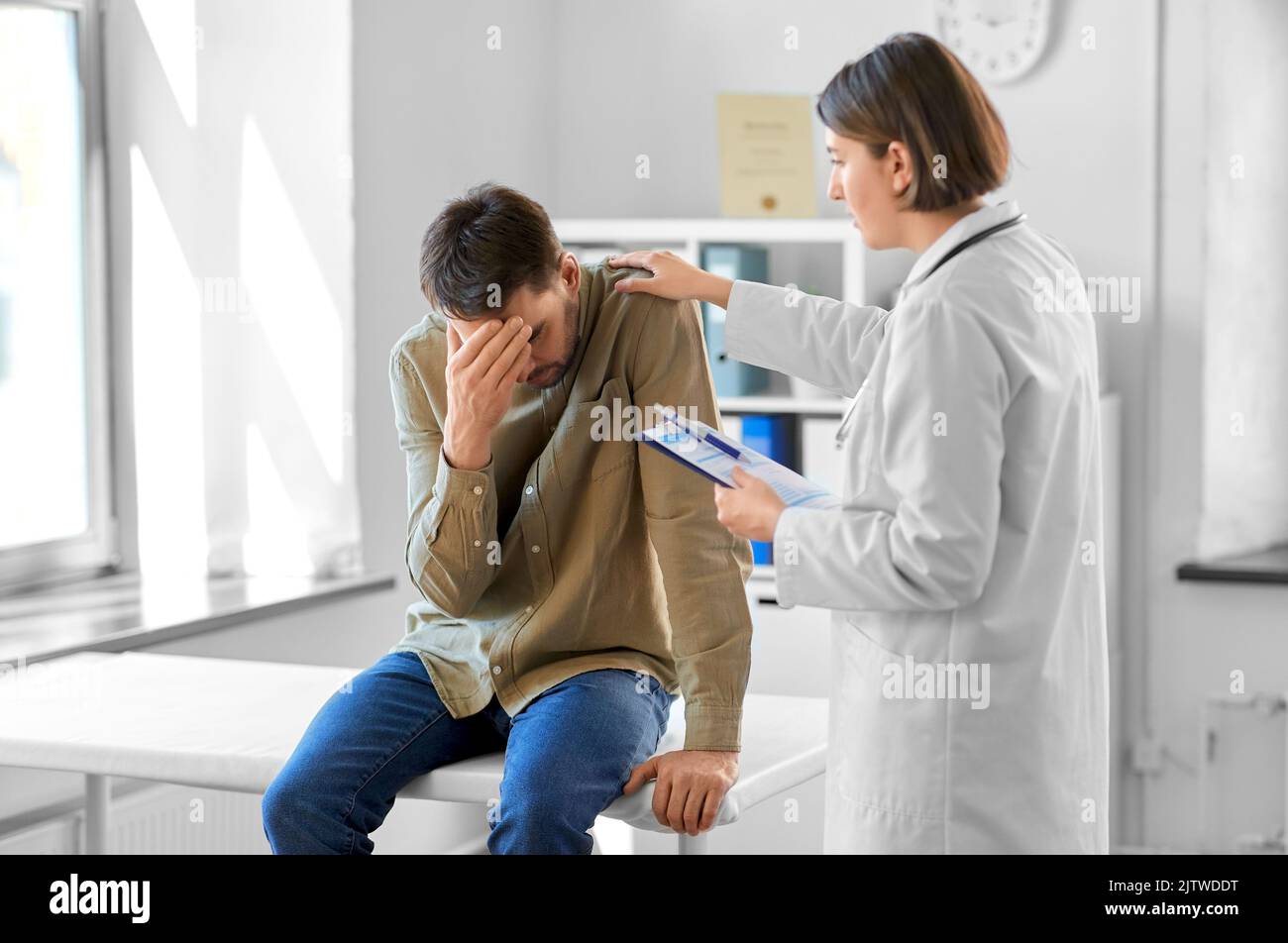 doctor and sad man with health problem at hospital Stock Photo - Alamy