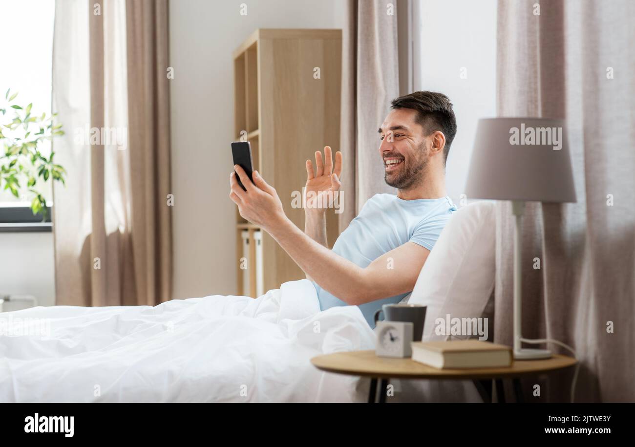 Bed phone call hi-res stock photography and images - Alamy