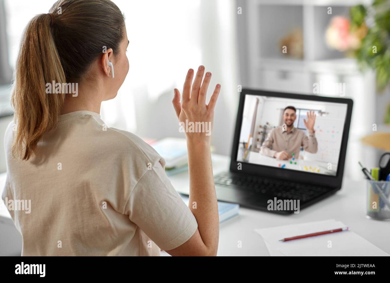 student with laptop having online class at home Stock Photo - Alamy