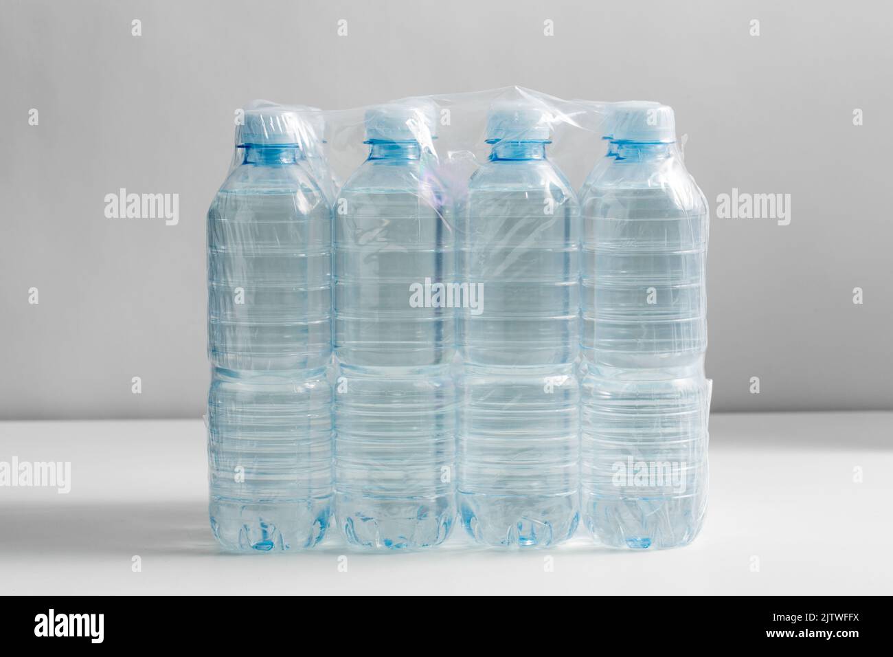 close up of plastic bottles with drinking water Stock Photo - Alamy