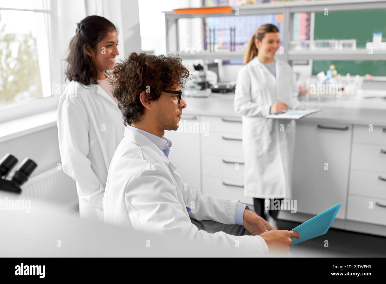 international group of scientists in laboratory Stock Photo - Alamy