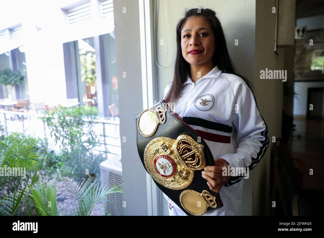 Érika “Dinamita” Cruz poses with her champion belt prior to the AMB ...
