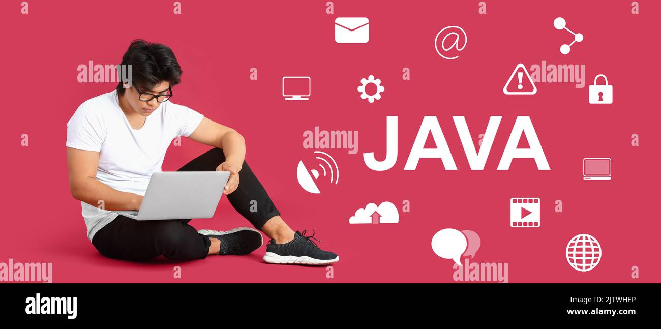 Male Asian programmer on red background Stock Photo - Alamy