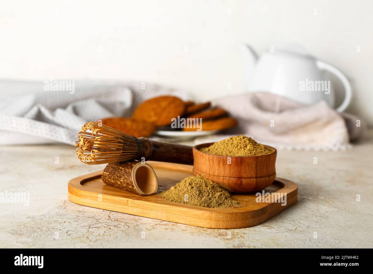 Bowl with natural hojicha powder and chasen on light background Stock ...