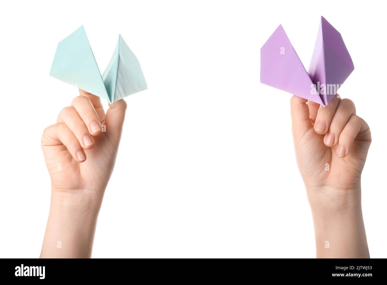 Woman with colorful paper planes on white background Stock Photo - Alamy
