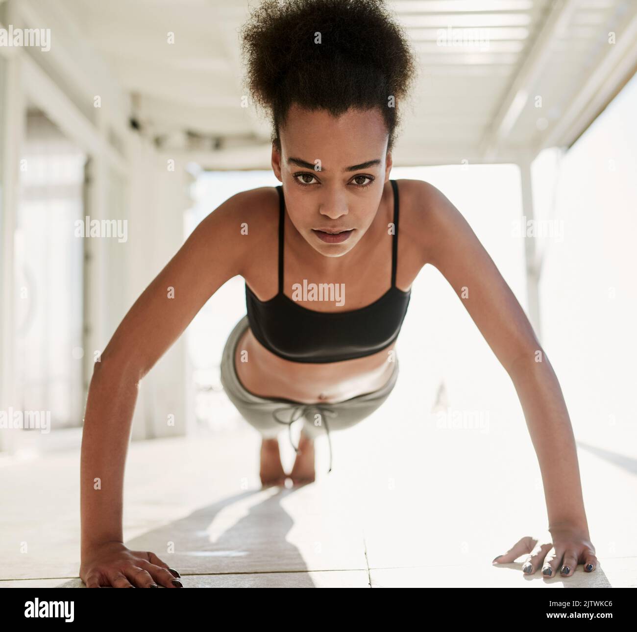 Success trains, failure complains. Portrait of a sporty young woman ...