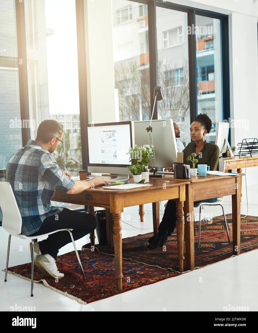 Theyve each got a job to do. Full length shot of two businesspeople ...