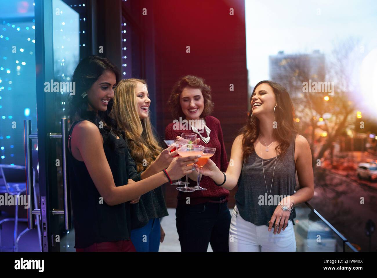 Saturday night sundowners with the ladies. a group of young women ...