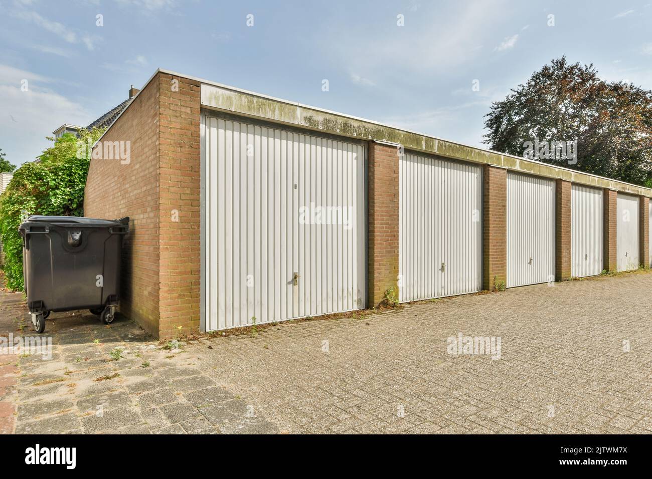 Spacious garages with closed door Stock Photo - Alamy
