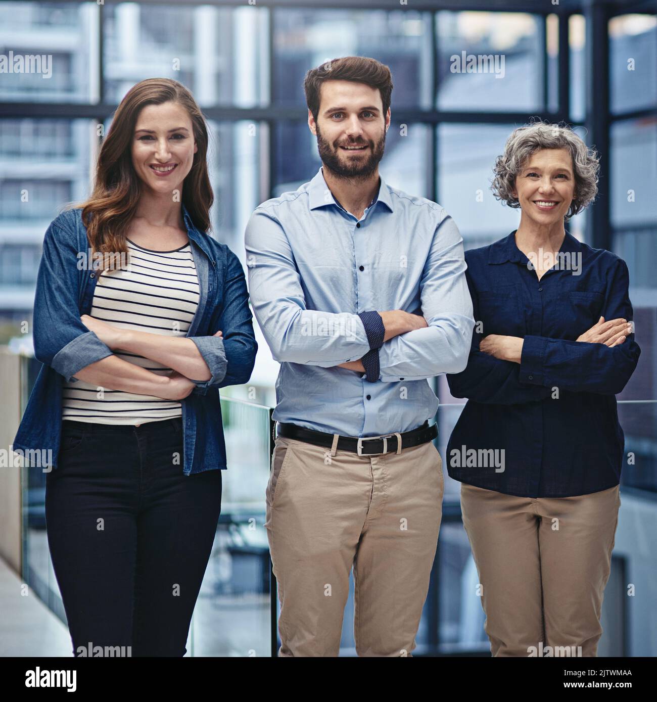 Confidence and teamwork. Portrait of a group of creatives standing with ...