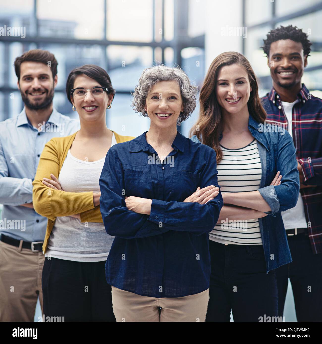 Confidence and teamwork. Portrait of a group of creatives standing with ...