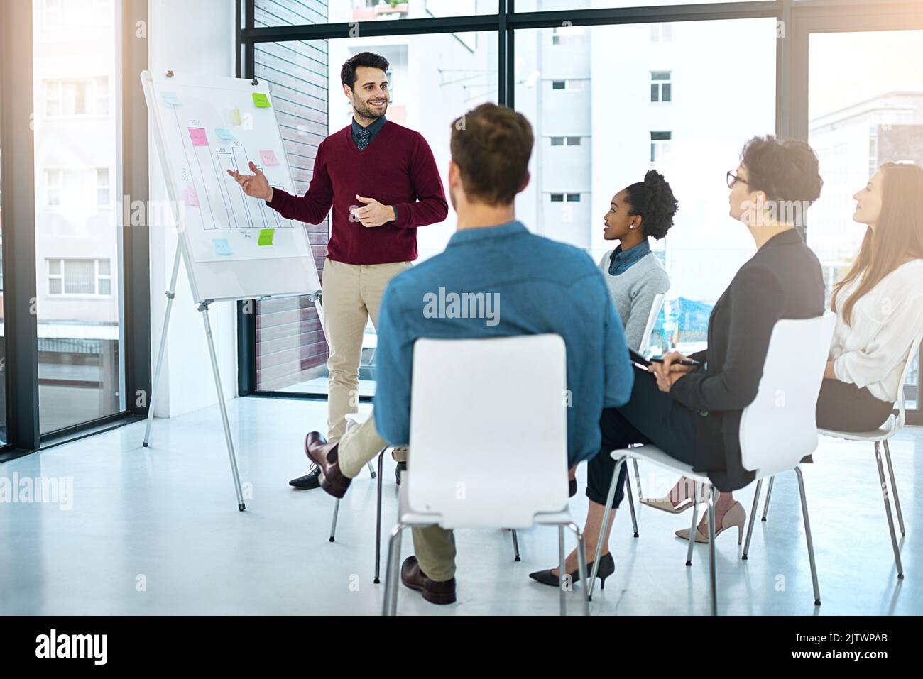 Expanding on their business potential. a businessman giving a ...